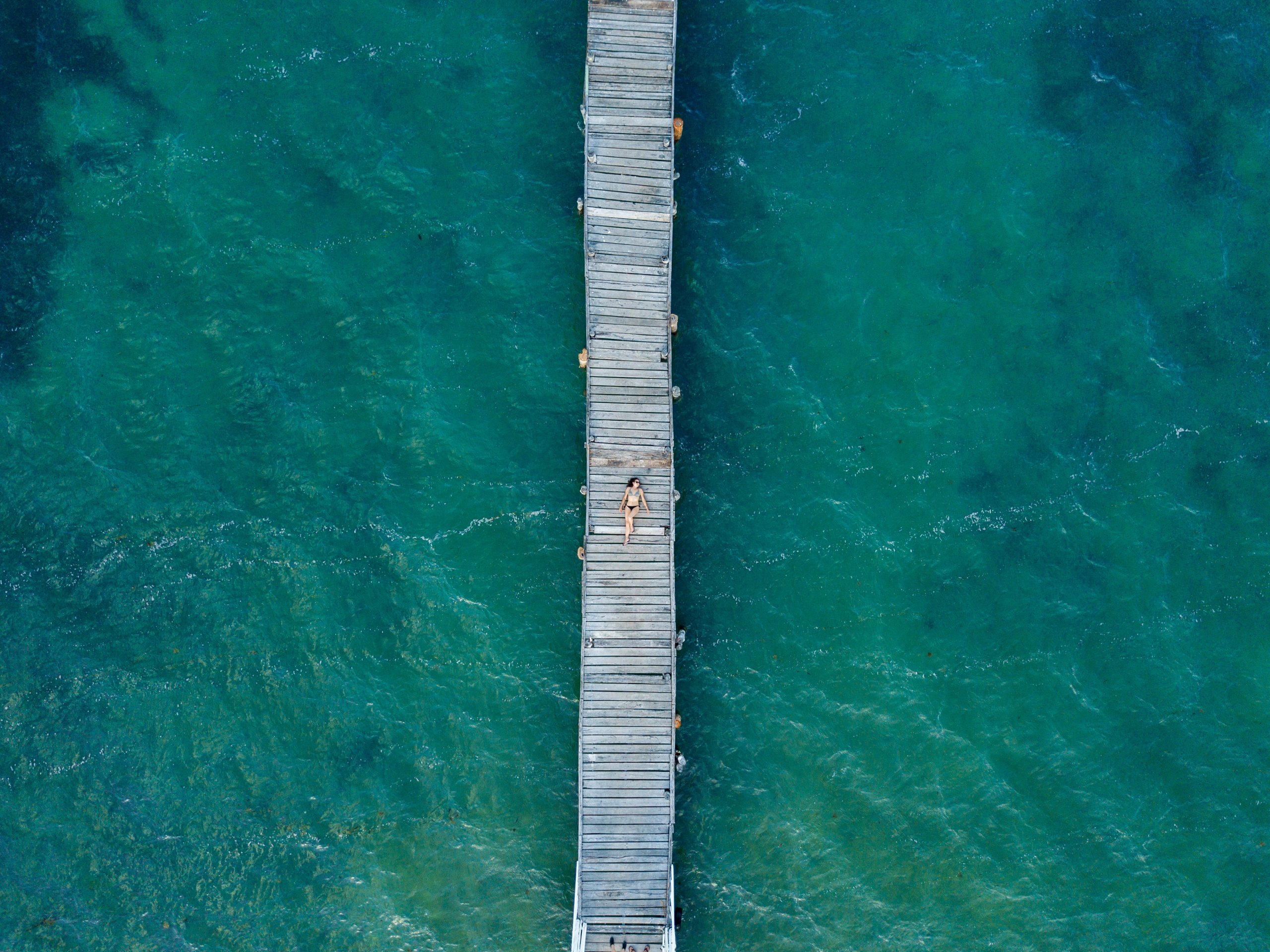 bird-s-eye-view-of-jetty-2441295 - American Travel Blogger